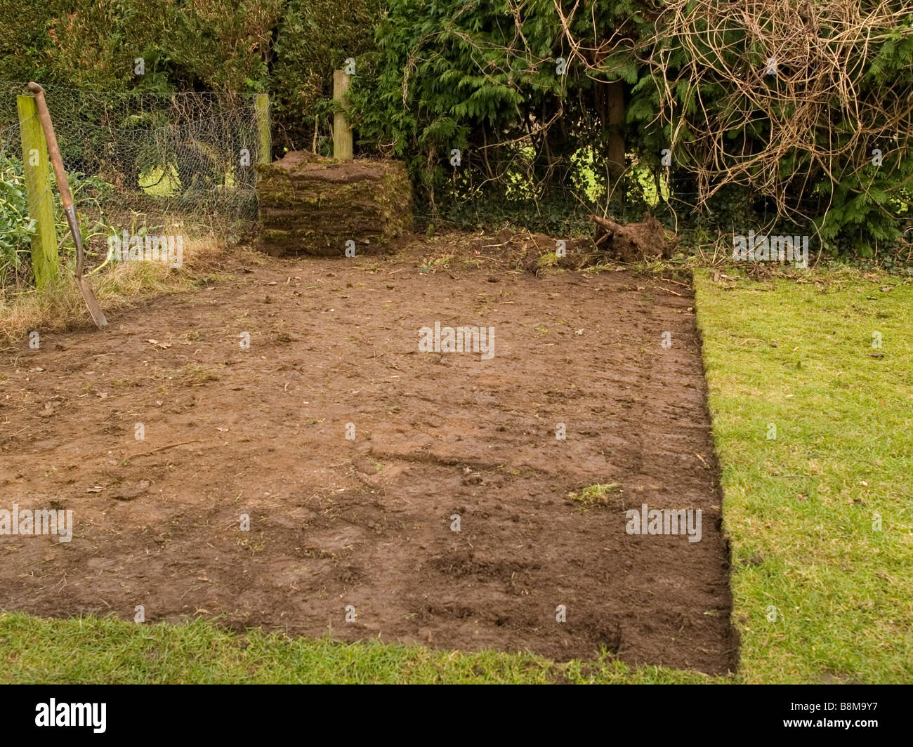 clearing ground for vegetable plot Stock Photo - Alamy