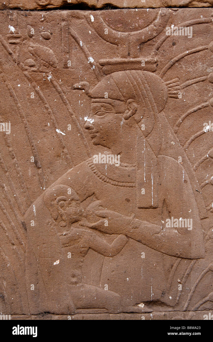A carving of the god Horus as a baby at Edfu Temple on the Nile River ...