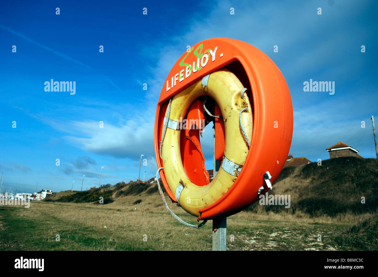 Orange lifebuoy ring at Shoreham Harbour West Sussex Stock Photo - Alamy