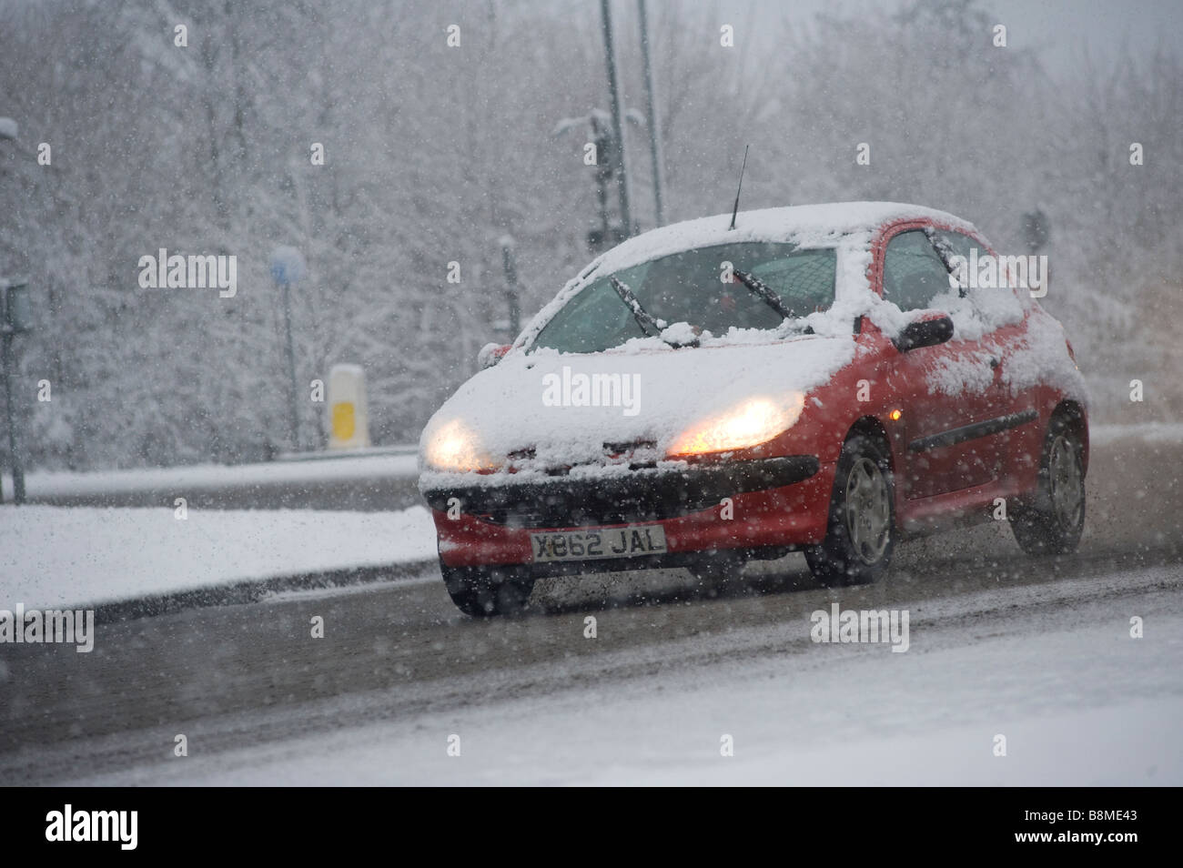 Car driving slowly hi-res stock photography and images - Alamy