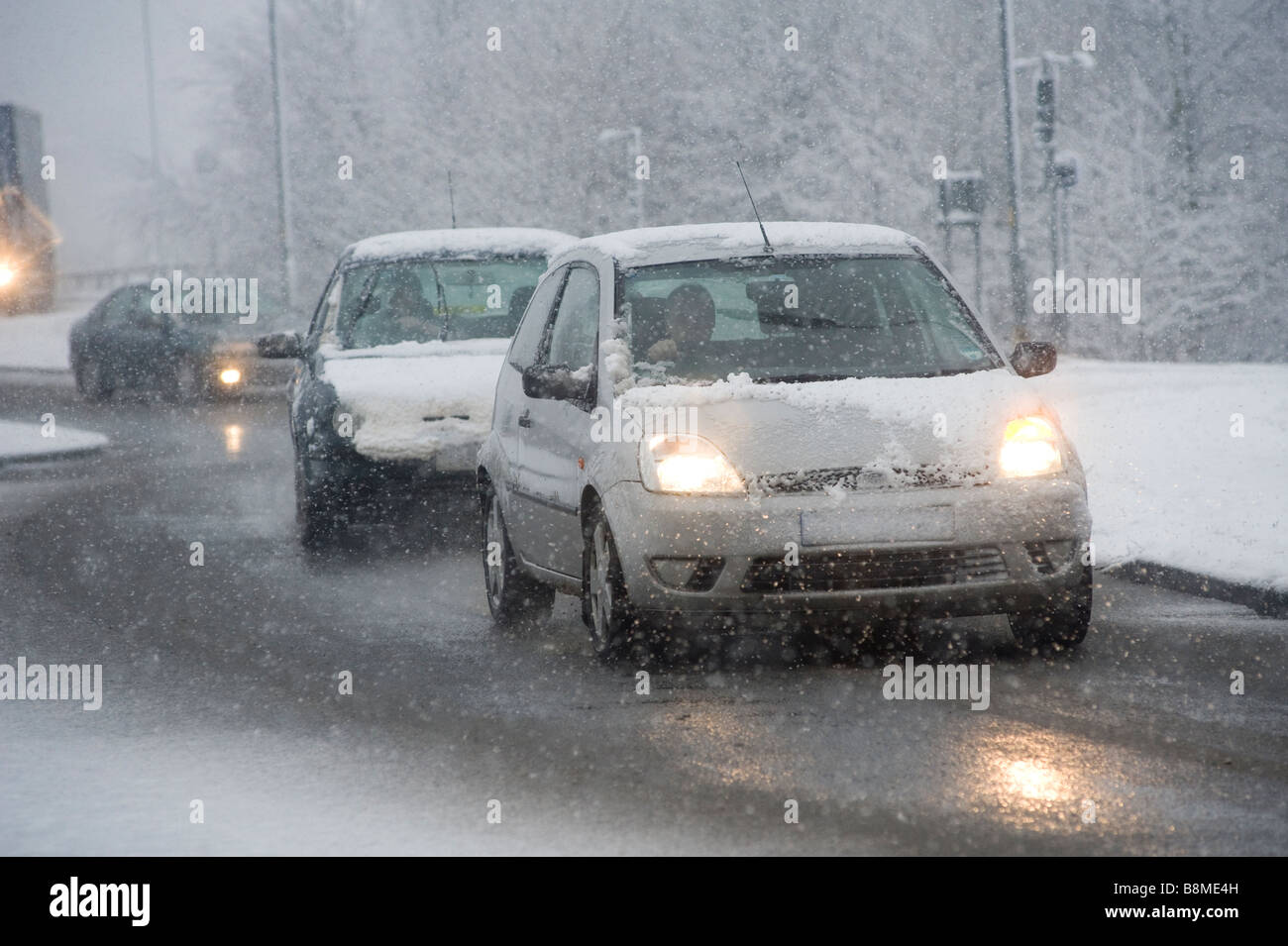 Car driving slowly hi-res stock photography and images - Alamy