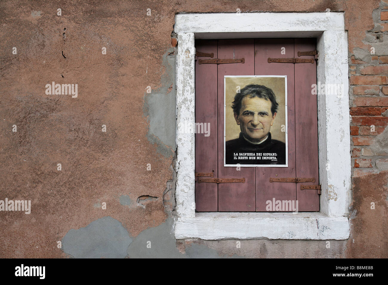 Poster in a window frame venice italy Stock Photo - Alamy