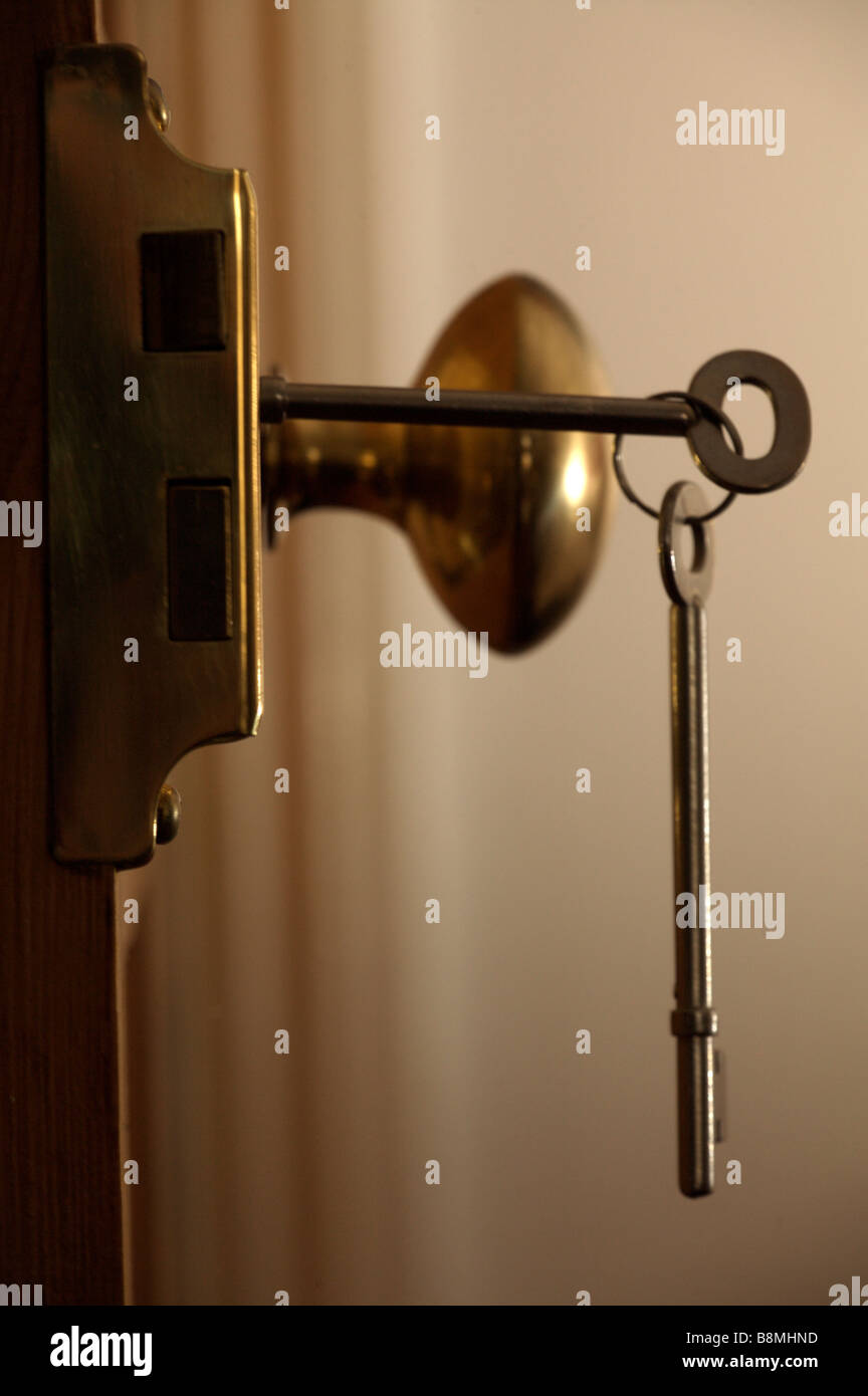 keys in a lock Stock Photo - Alamy