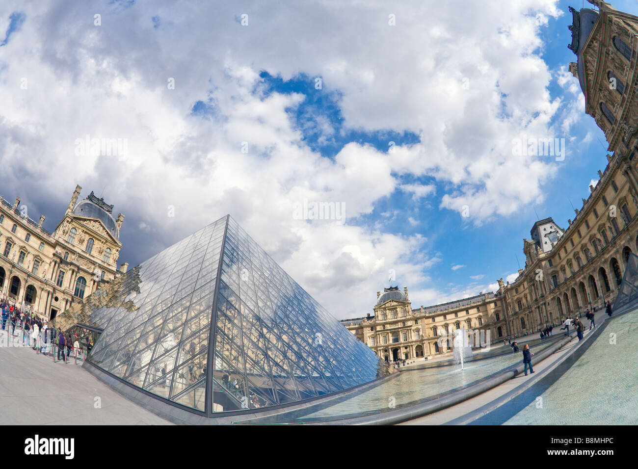 Fountains Pyramide and exterior of Musee du Louvre Museum Paris France ...