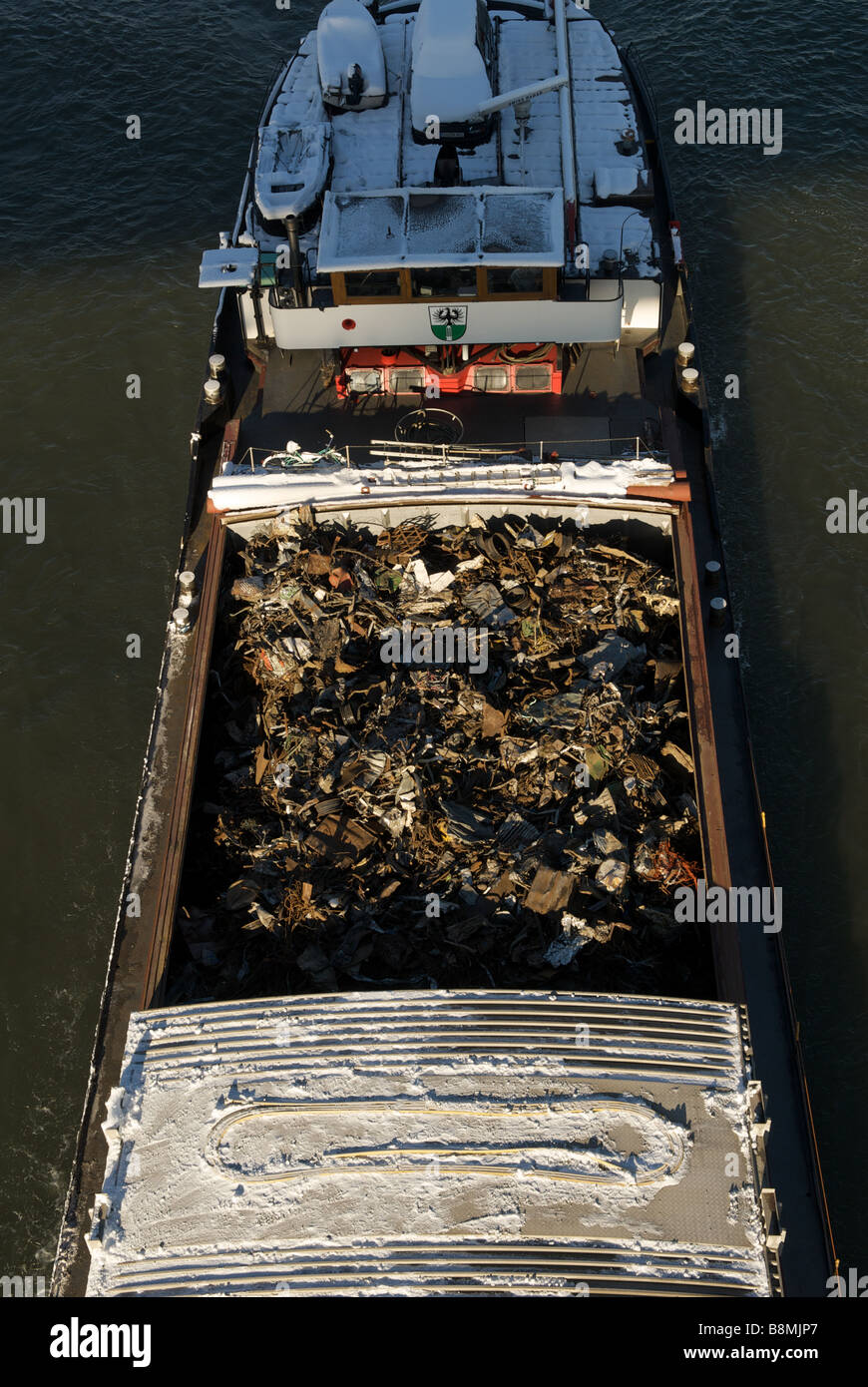 Barge on the river Rhine transporting scrap metal to a recycling ...