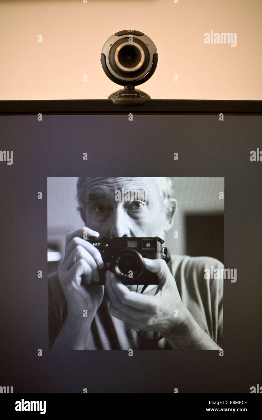 web camera on computer monitor showing photographic image of mature ...