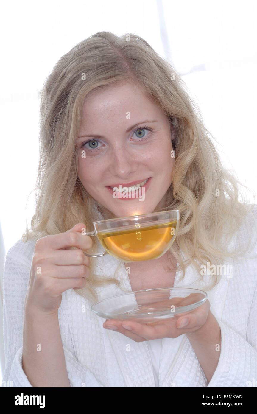 Beauty recipe - drinking tea Stock Photo - Alamy