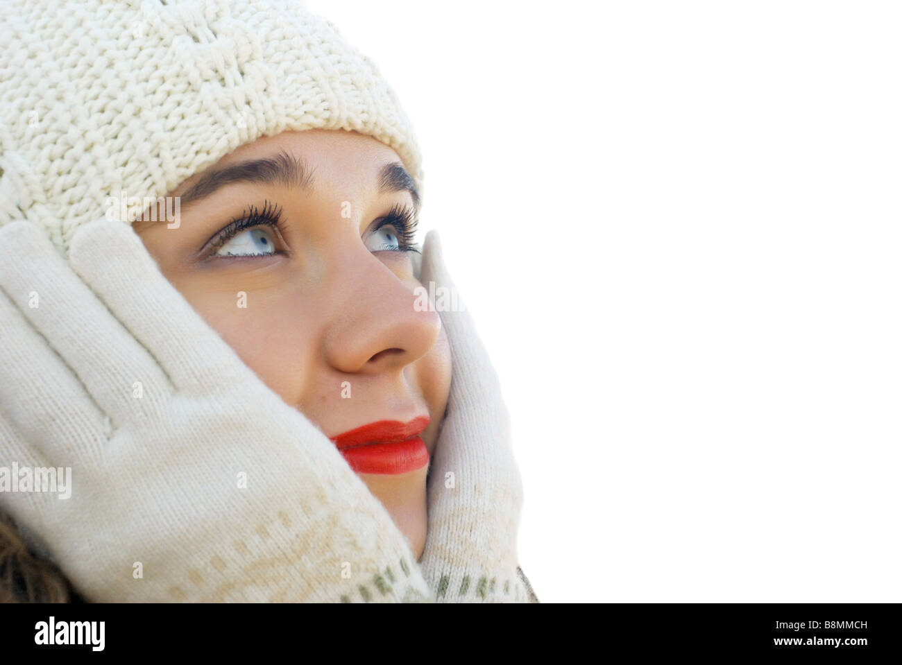 The girl in winter gloves Winter clothes of white color Stock Photo - Alamy