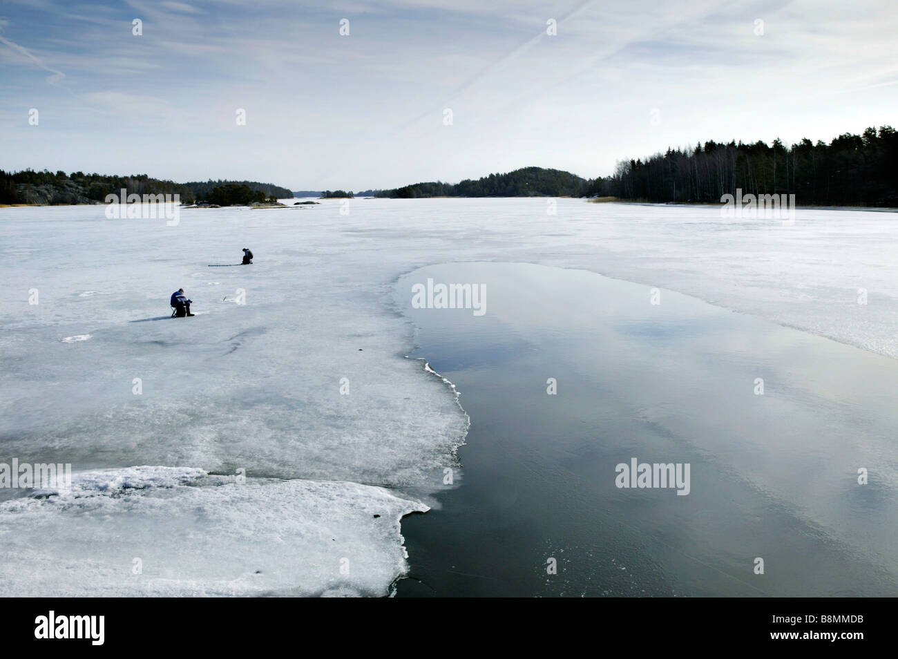 Ice fishermen fishing in frozen hi-res stock photography and images - Alamy