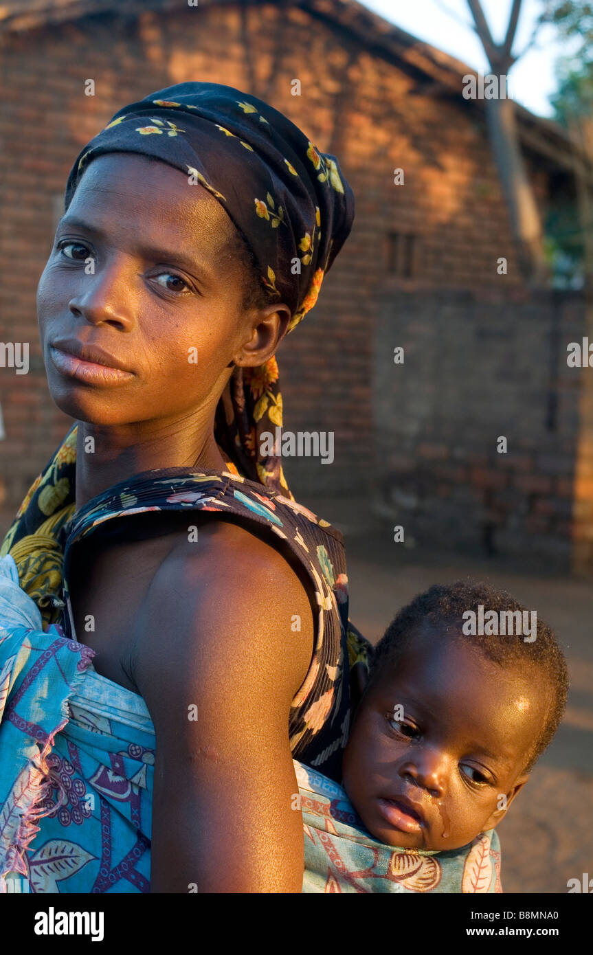 Malawi 2008 Sambo village early morning Mother and baby Stock Photo - Alamy