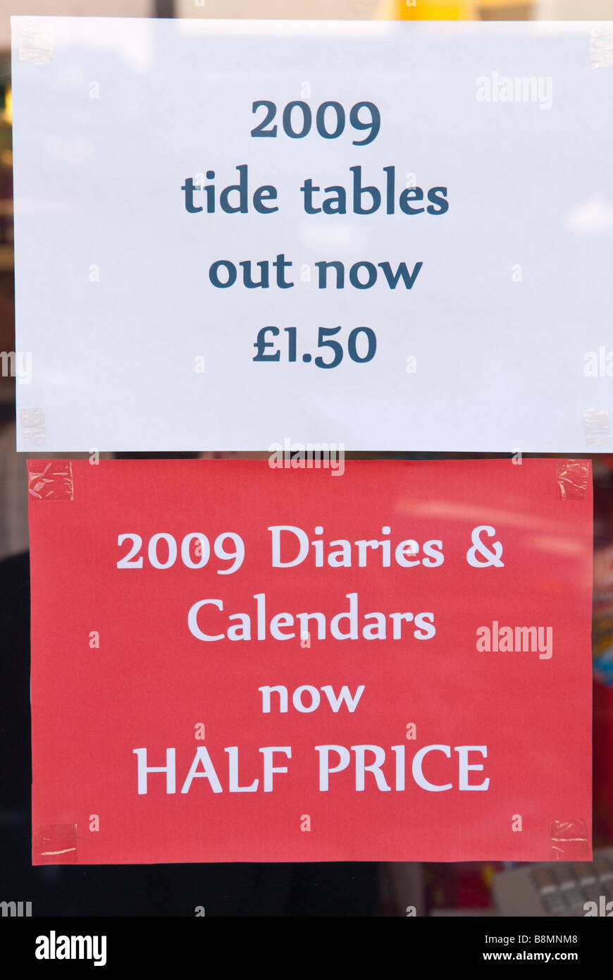 A sign advertising tide tables hi-res stock photography and images - Alamy