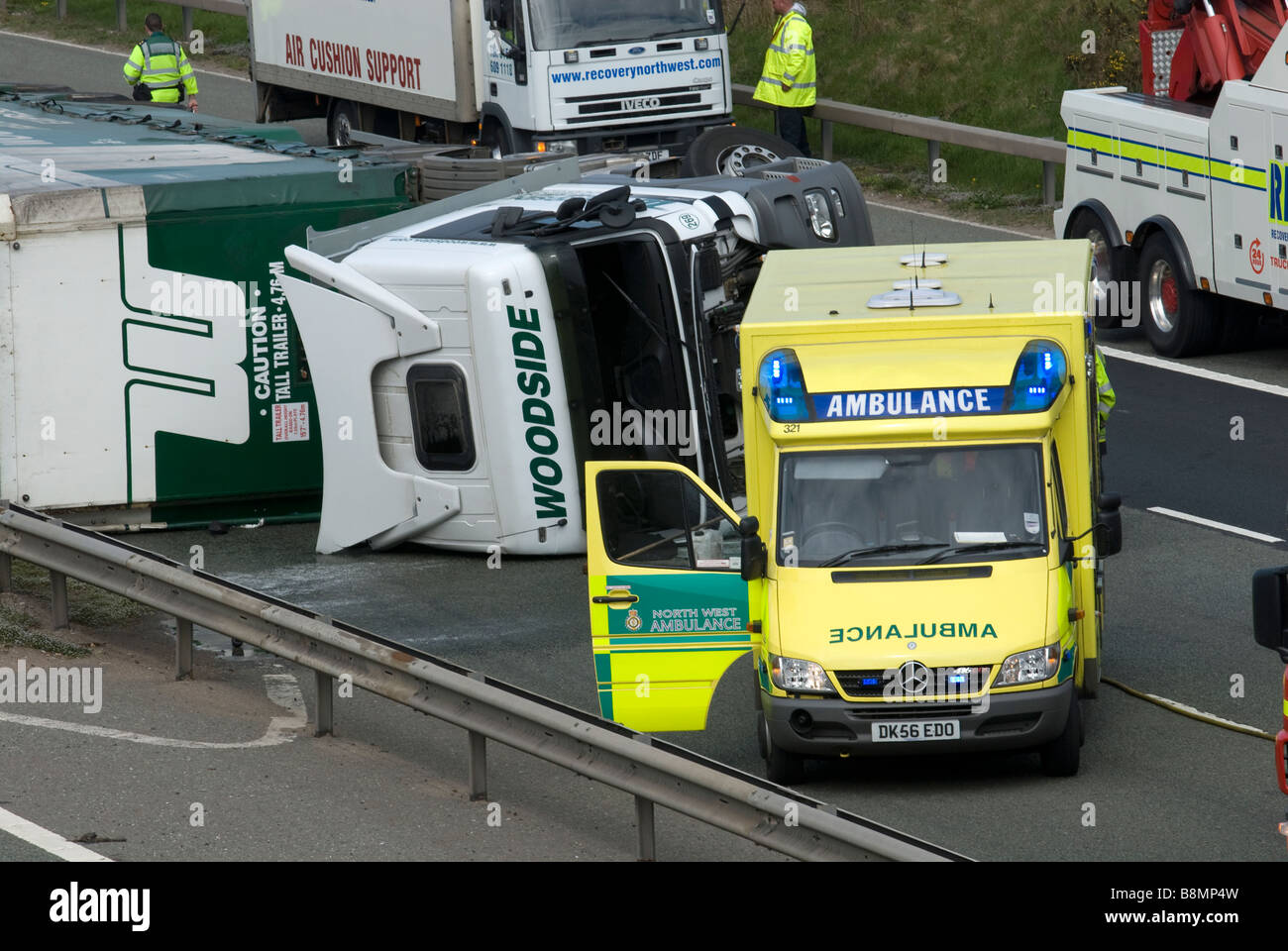 HGV crash overturned on motorway with ambulance and recovery trucks ...