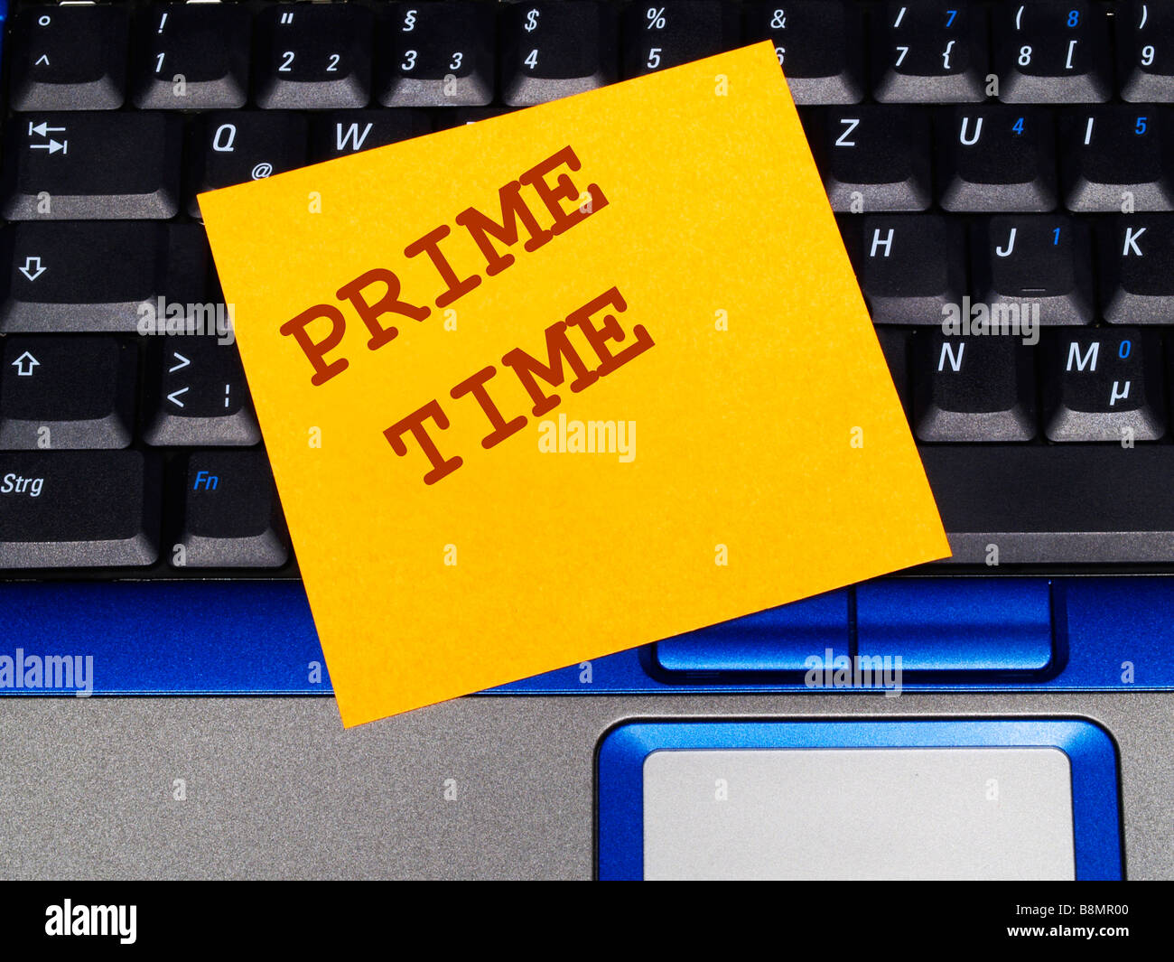 memo note on notebook, prime time Stock Photo - Alamy