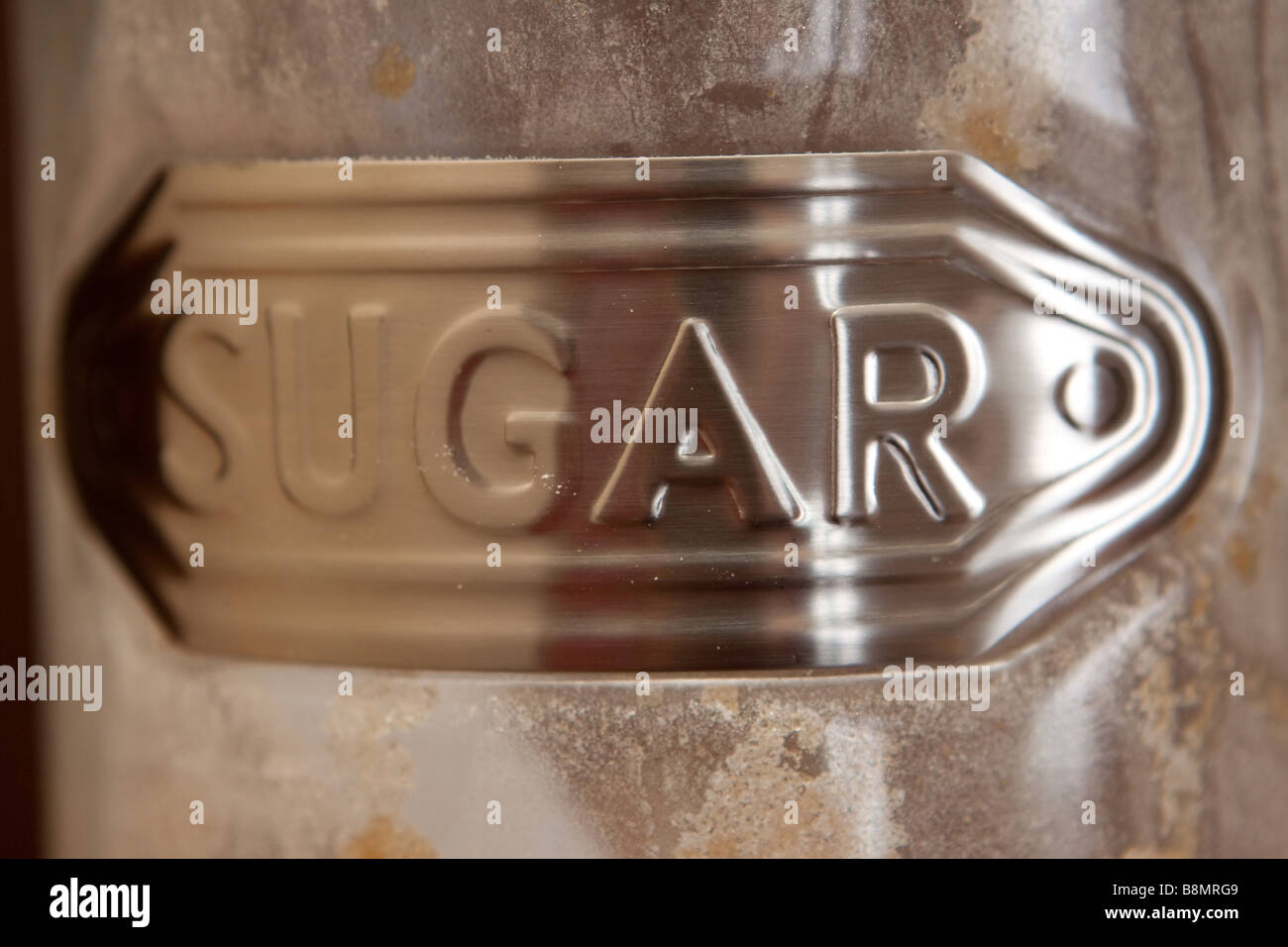 Sugar canister chrome label Stock Photo - Alamy