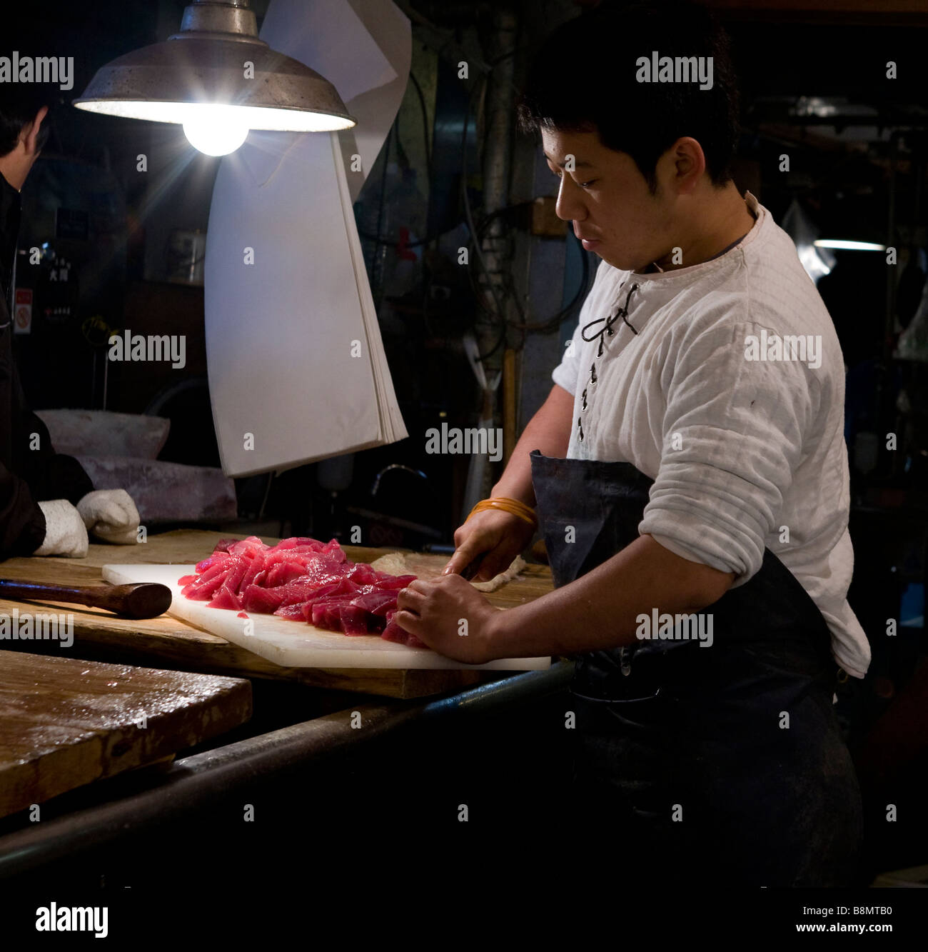 Man chopping meat at meat market hi-res stock photography and images ...