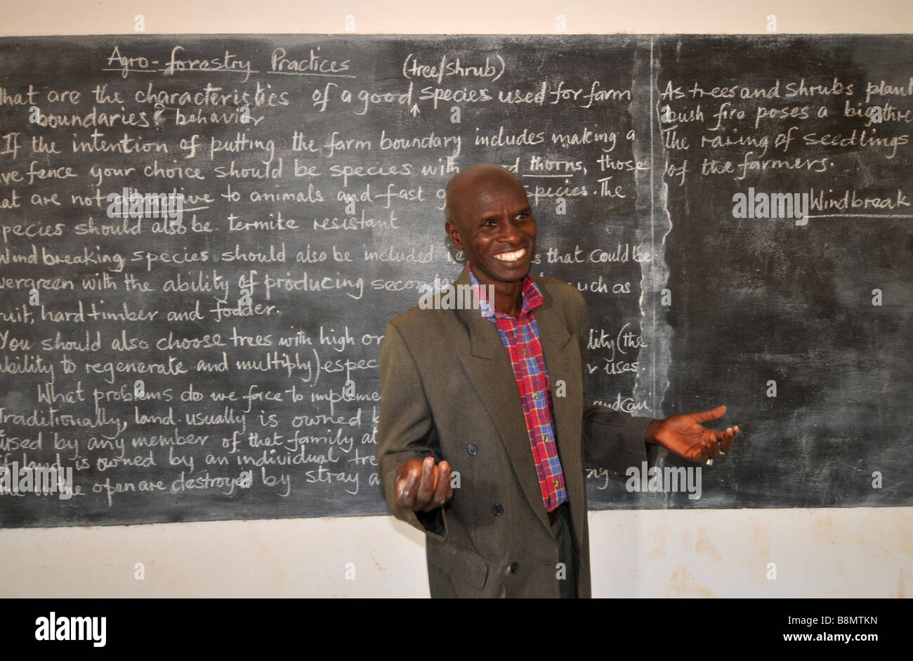 African teacher poor hi-res stock photography and images - Alamy