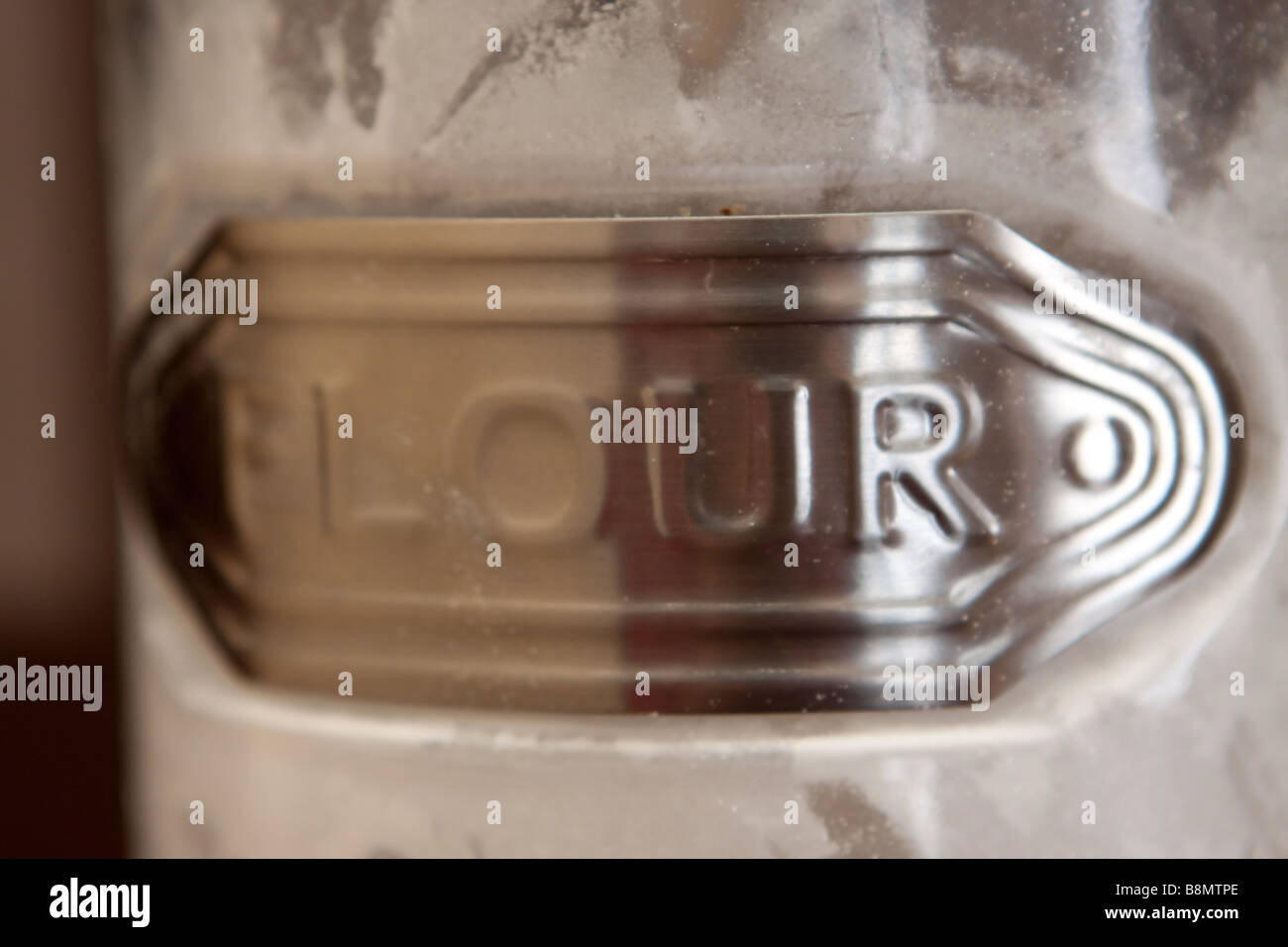Flour canister chrome label Stock Photo - Alamy