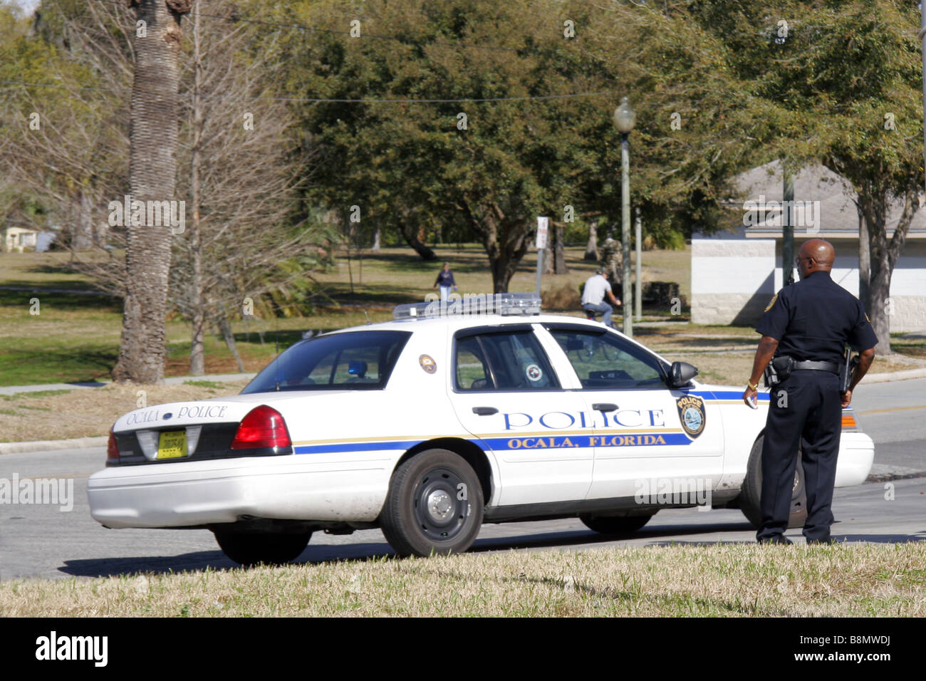 Police officer and Police car in Ocala Florida USA Stock Photo - Alamy