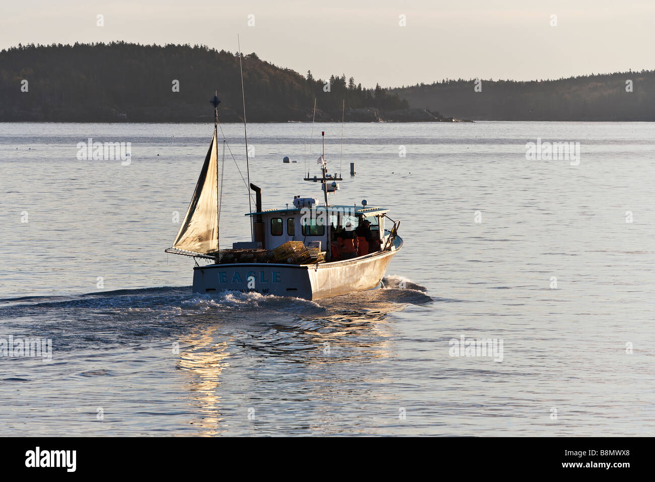 Fishing boat out at sea Stock Photo - Alamy