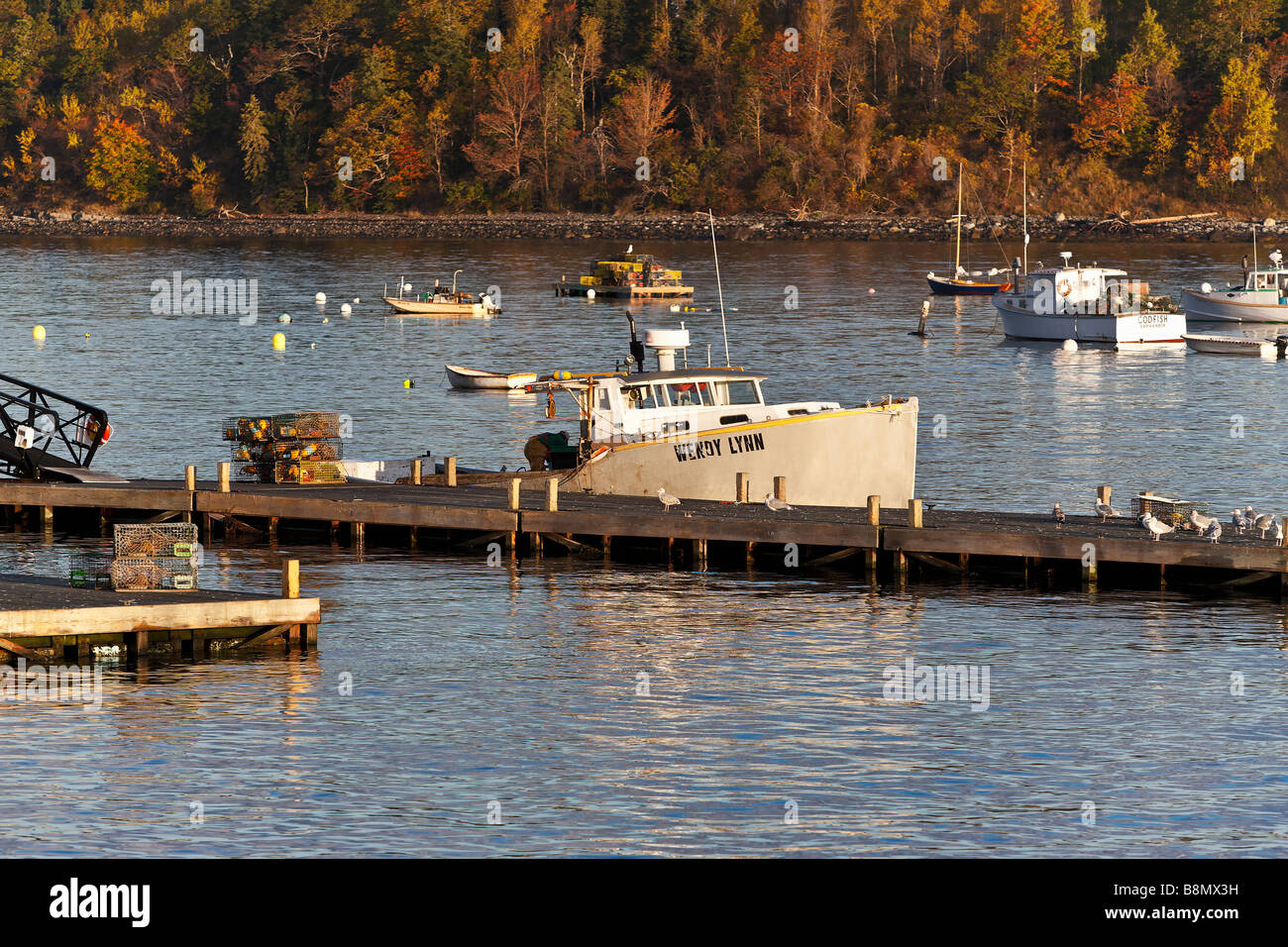 Fishing boats in harbor Stock Photo - Alamy