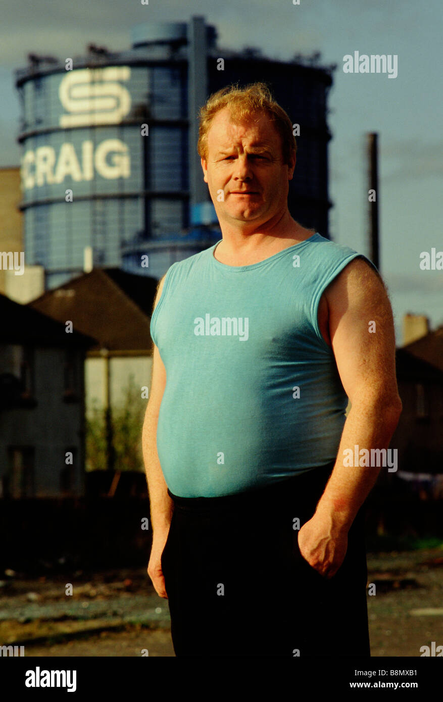 Motherwell, Scotland. A redundant steel-worker. Behind him Ravenscraig ...