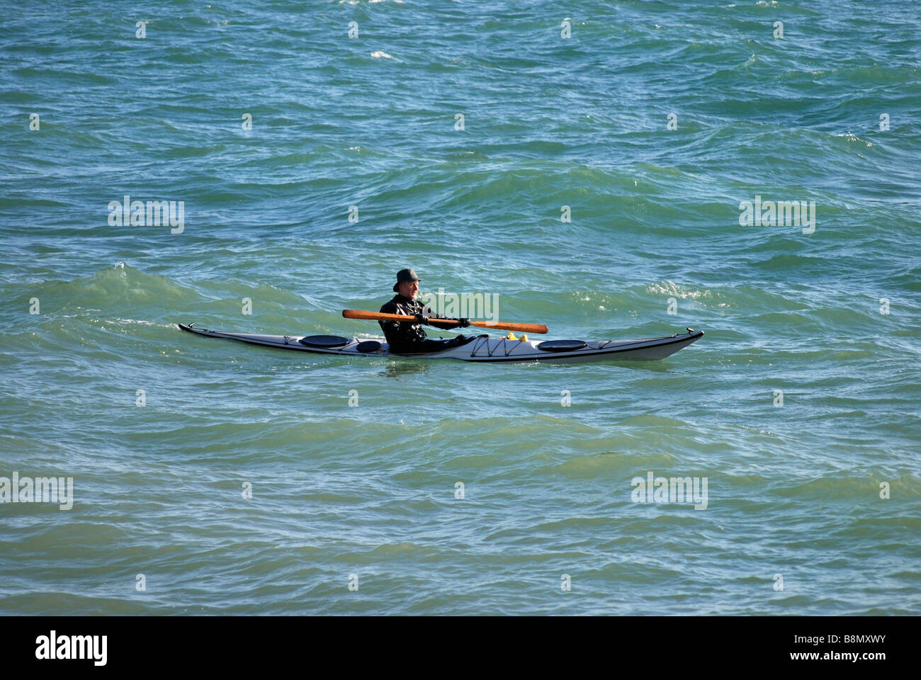 Canoeist in the sea Stock Photo - Alamy