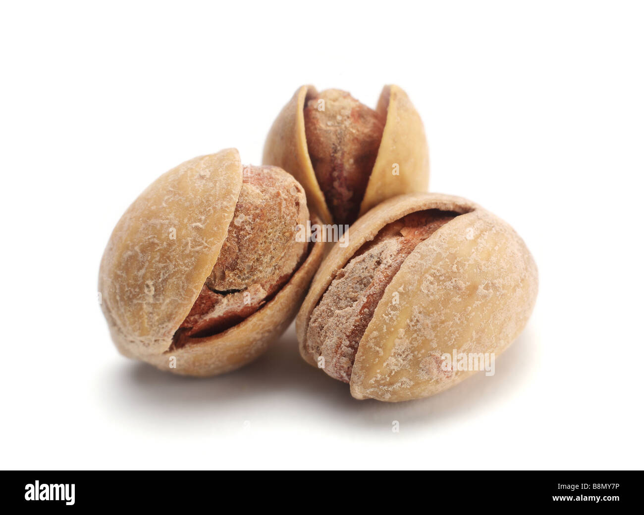 Pistachio nut group isolated on white background Stock Photo - Alamy