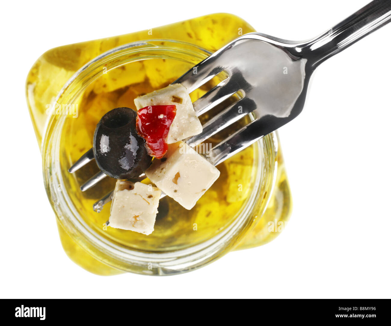 Cheese feta with olive and spice in oil Stock Photo - Alamy