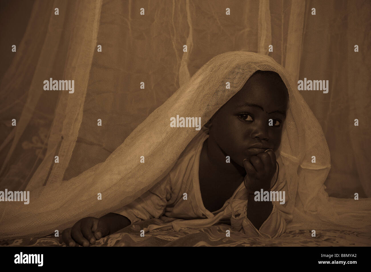 Nigerian child mosquito hi-res stock photography and images - Alamy