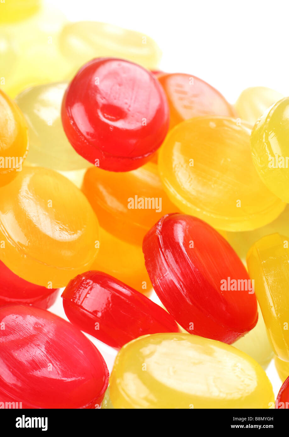 Color candy glass pill on white background Stock Photo - Alamy