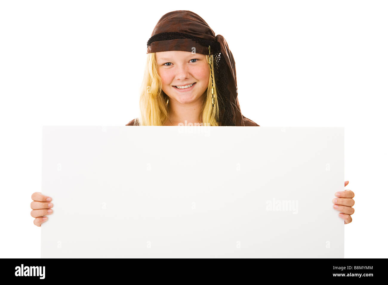 Beautiful girl dressed in her Halloween costume holding a blank sign ...