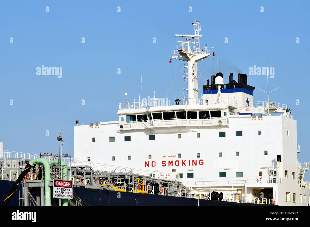 Bridge superstructure of "oil tanker" with "no smoking" signs, windows ...