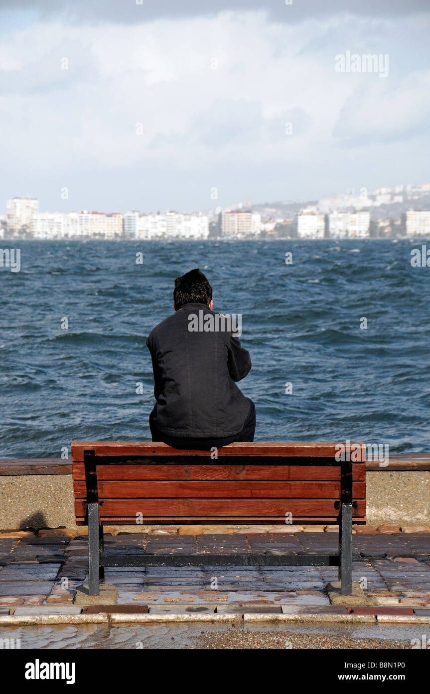 Man sitting bench rear view hi-res stock photography and images - Alamy