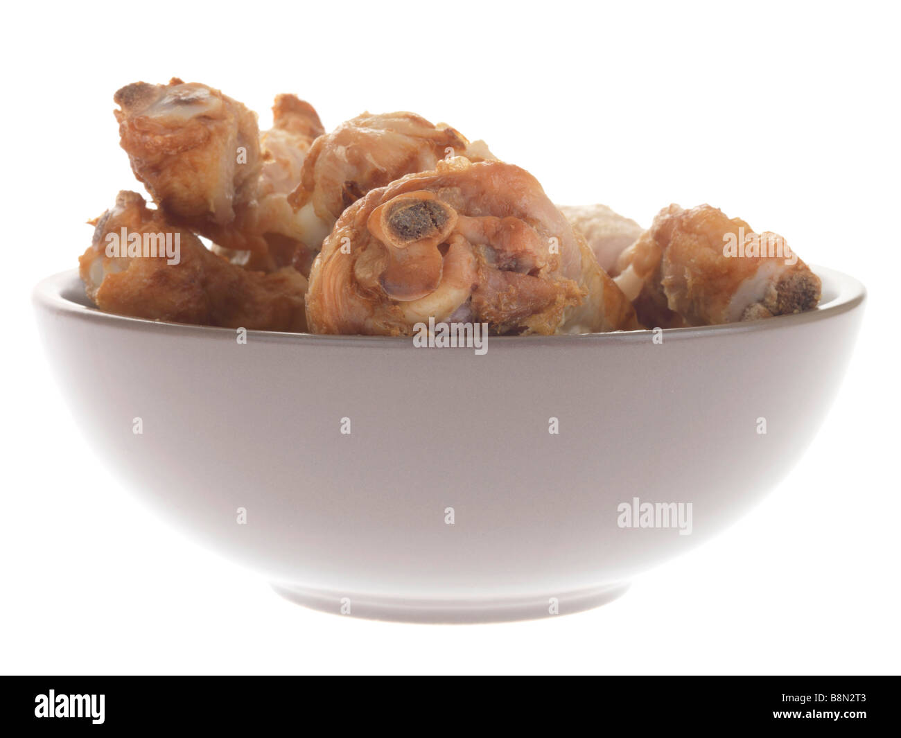 Cooked Tender Succulent Cold Chicken Legs Or Drumsticks Against A White ...