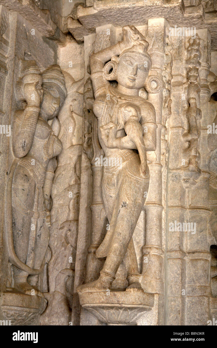 marble carved wall statue at the chaumukha mandir temple Stock Photo ...