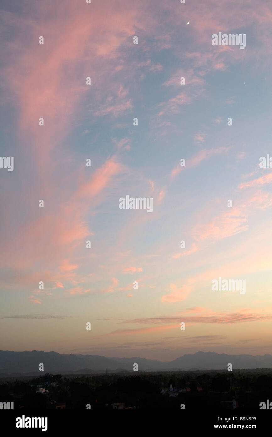 backlit sunset clouds and landscape of hills over ghanerao Stock Photo ...