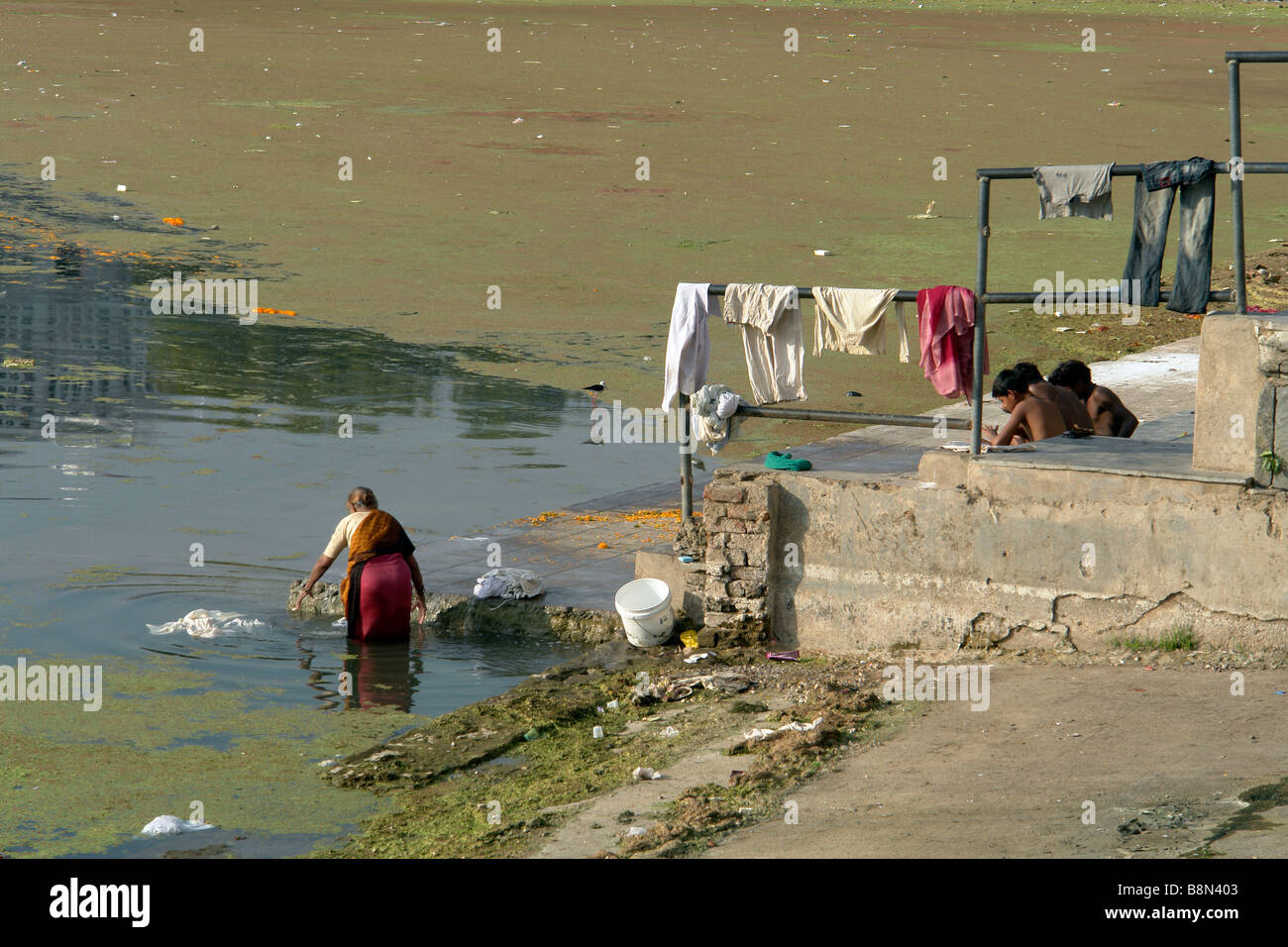 Indian woman doing laundry hi-res stock photography and images - Alamy