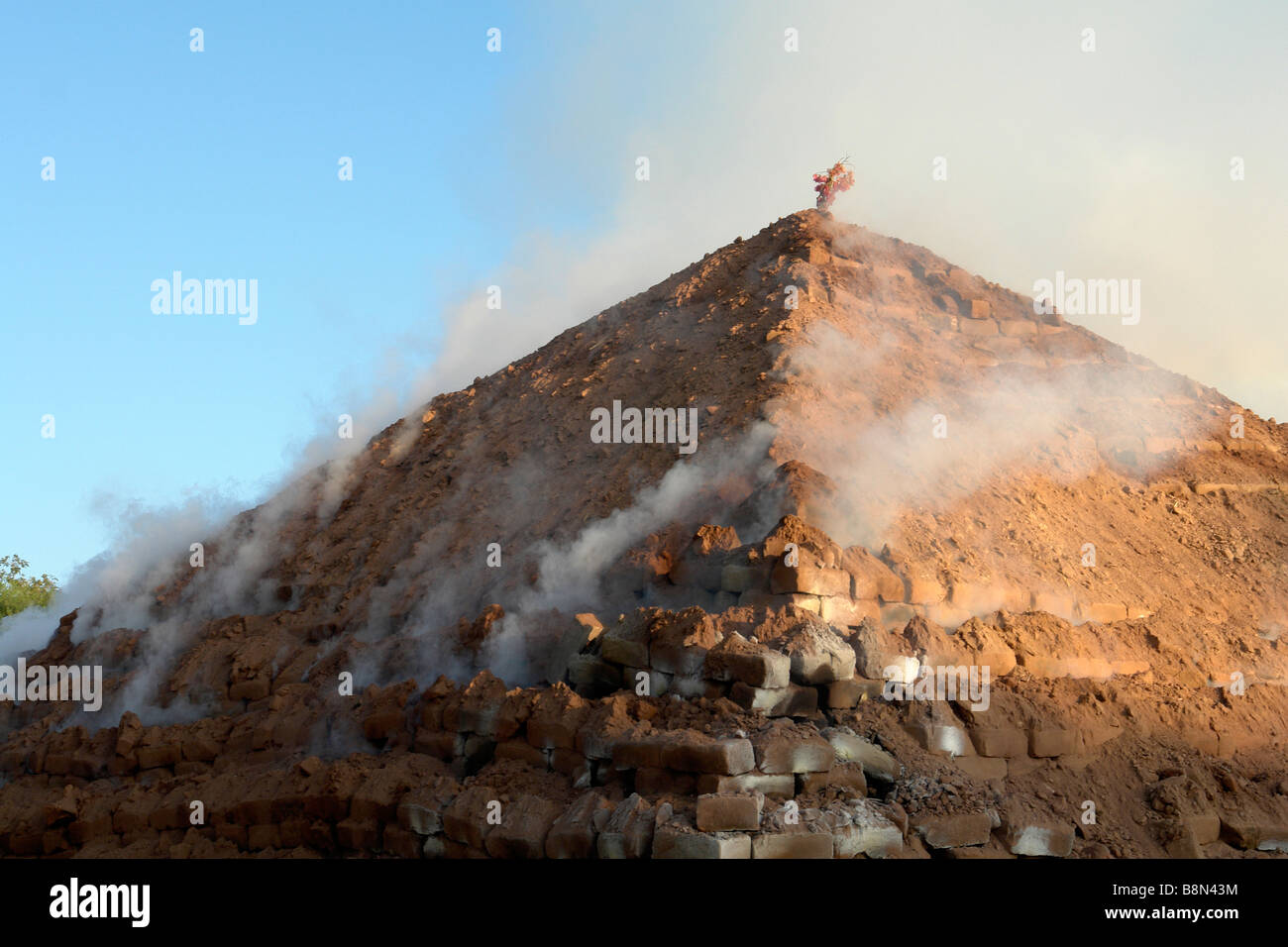 traditional indian clay brick kiln smoking at dawn Stock Photo - Alamy