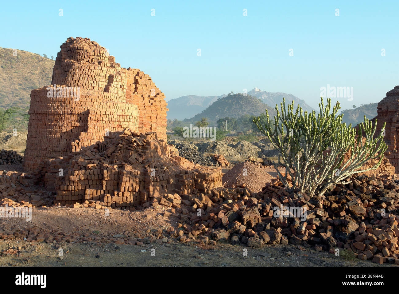 traditional indian clay fired bricks at a rural brickworks with country ...