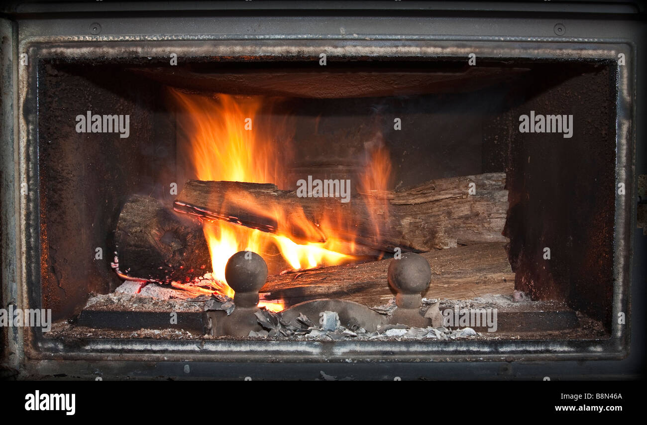 Fireplace logs flames hi-res stock photography and images - Alamy