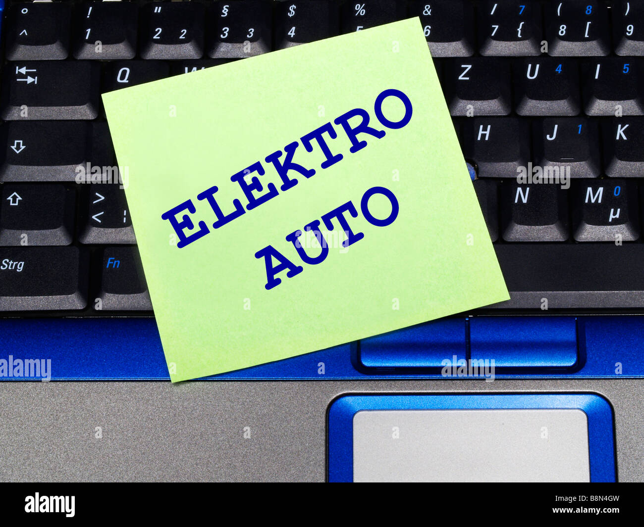 memo note on notebook, electric powered car Stock Photo - Alamy