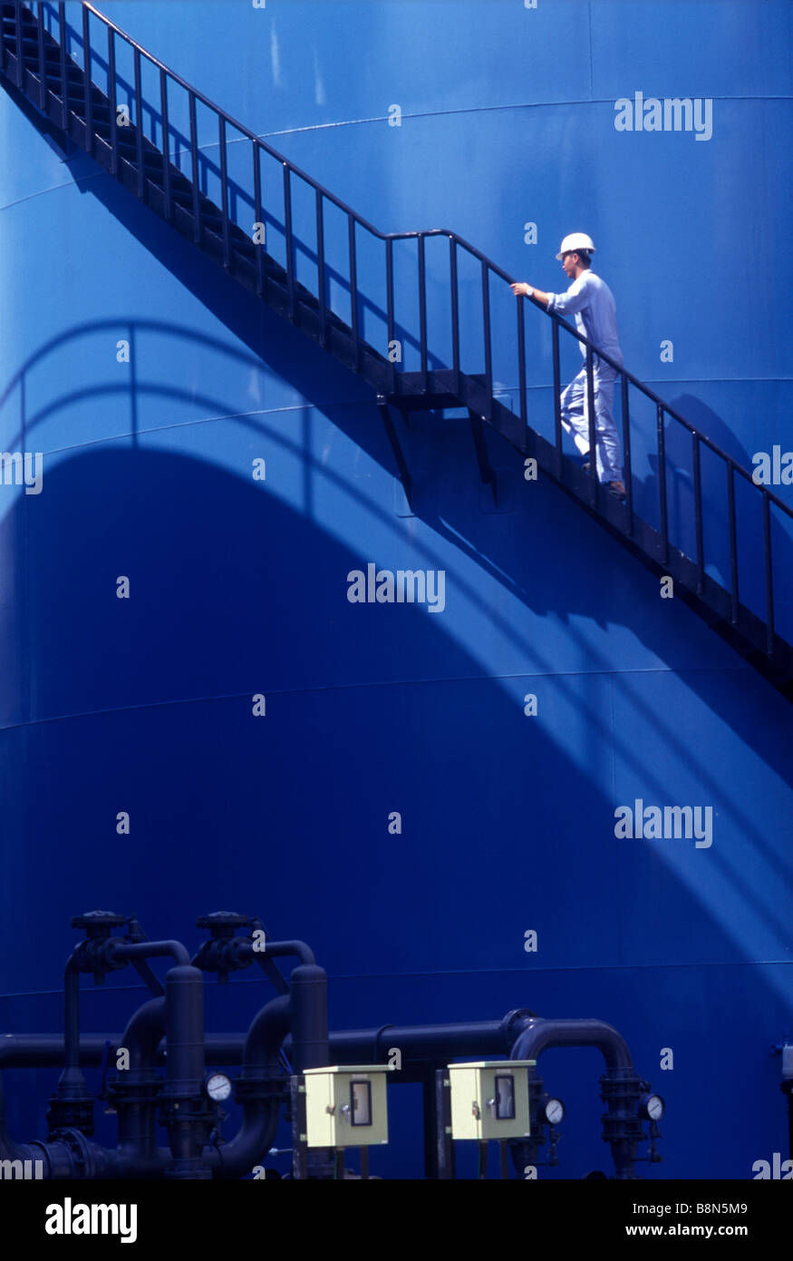 Climbing oil storage tank hi-res stock photography and images - Alamy