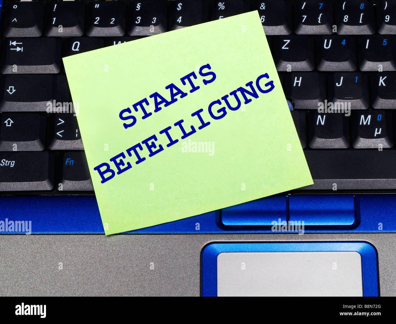 memo note on notebook, state cooperation Stock Photo - Alamy