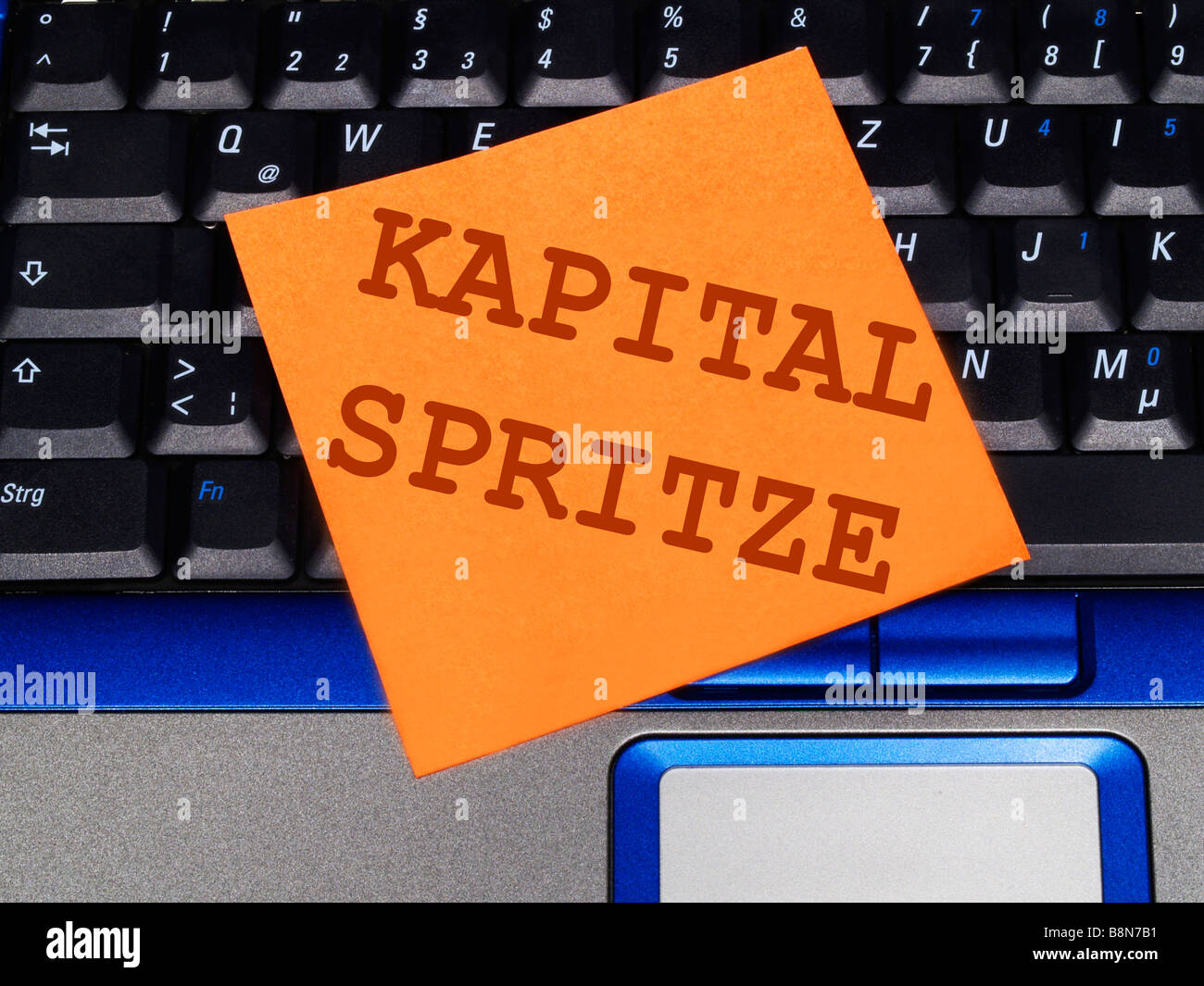 memo note on notebook, injection of capital Stock Photo - Alamy