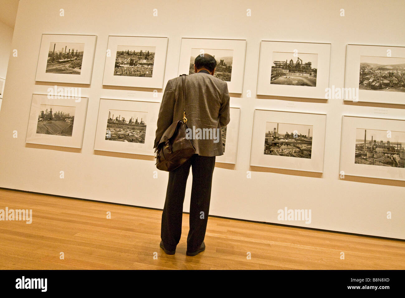Visitor viewing an exhibit at the Museum of modern art Stock Photo - Alamy