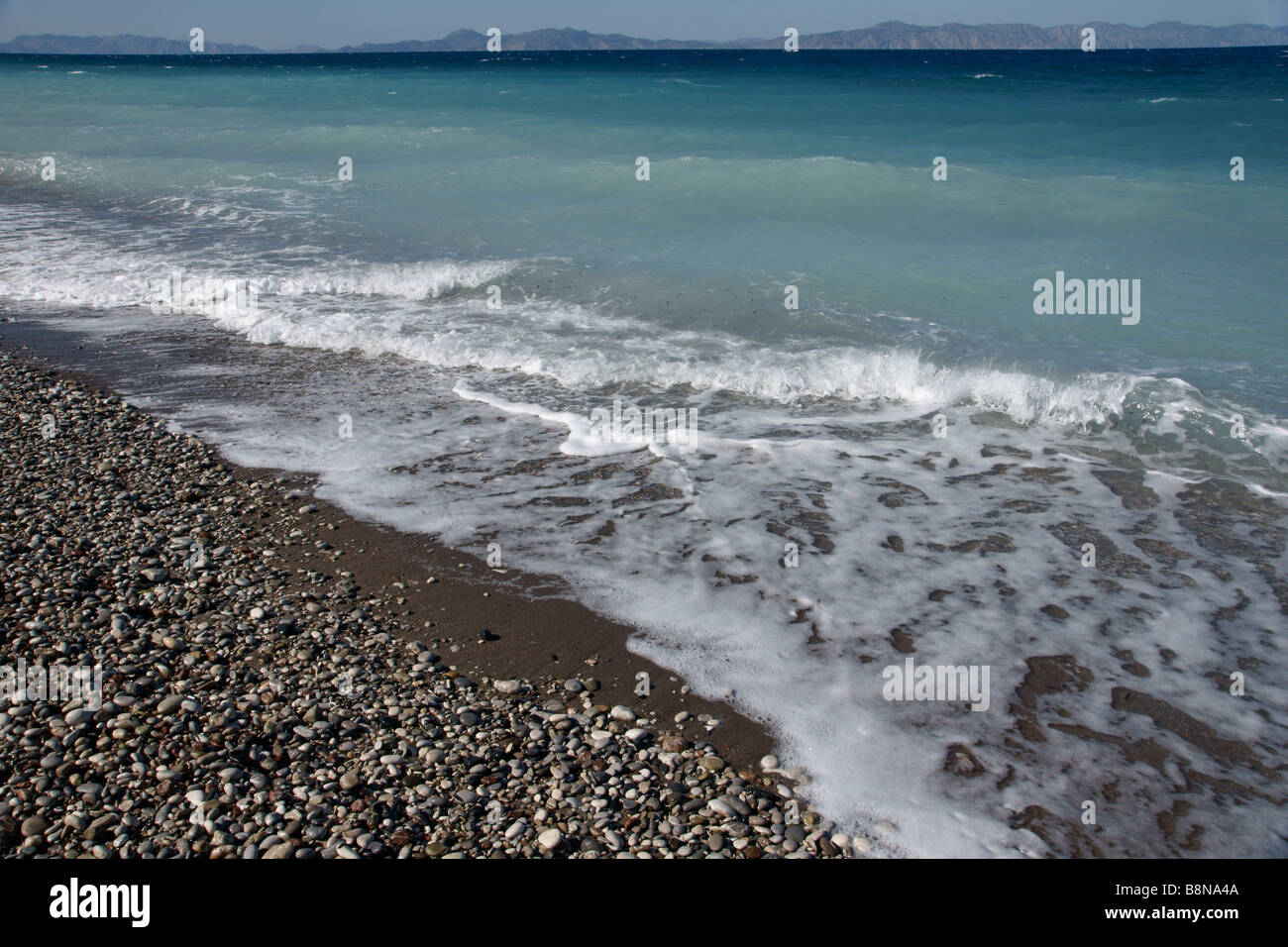 Waves on a beach Rhodes Greece (c) Marc Jackson Photography Stock Photo ...