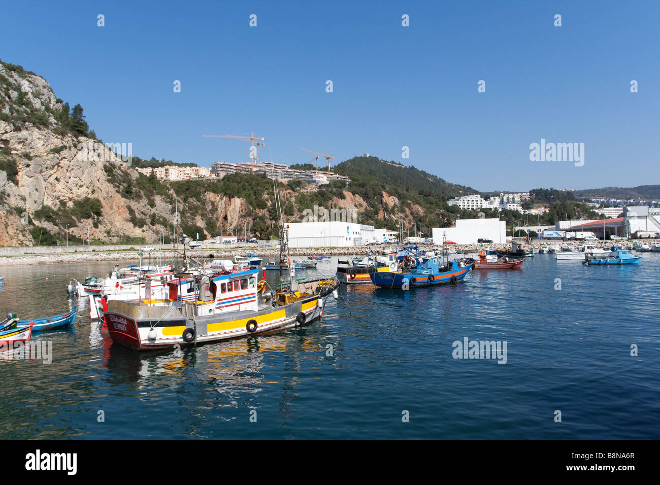 Traditional fishing boats at the fishing harbour of Sesimbra (Setubal ...