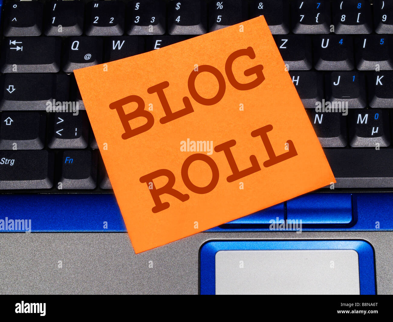 memo note on notebook, blogroll Stock Photo - Alamy