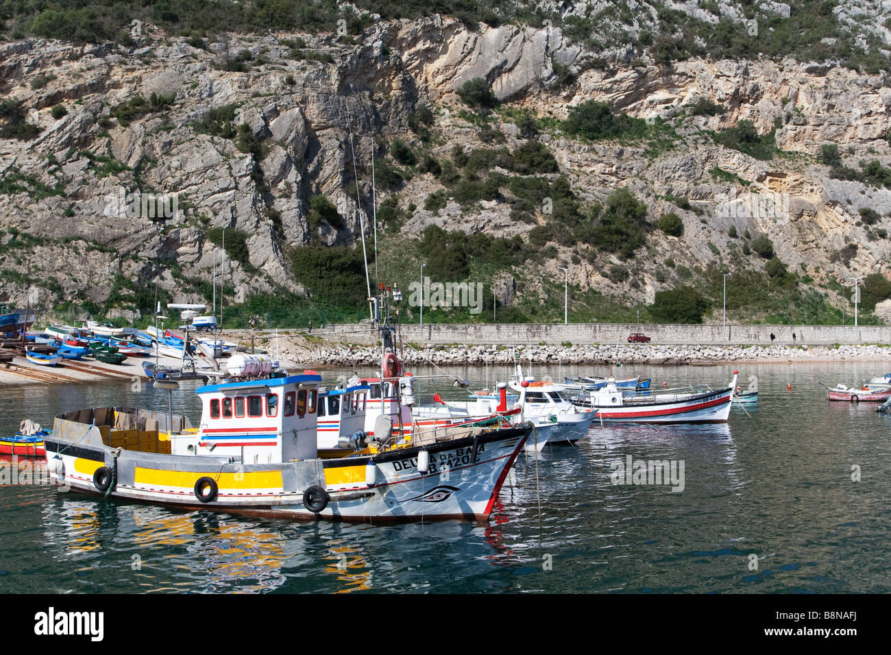 Traditional fishing boats at the fishing harbour of Sesimbra (Setubal ...