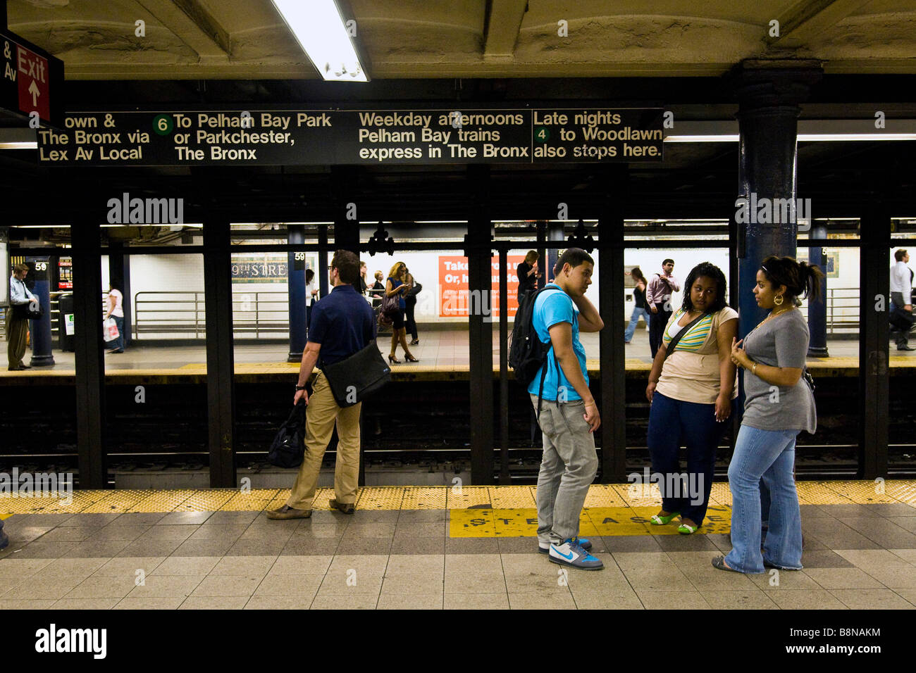 Commuters at underground subway station Stock Photo - Alamy